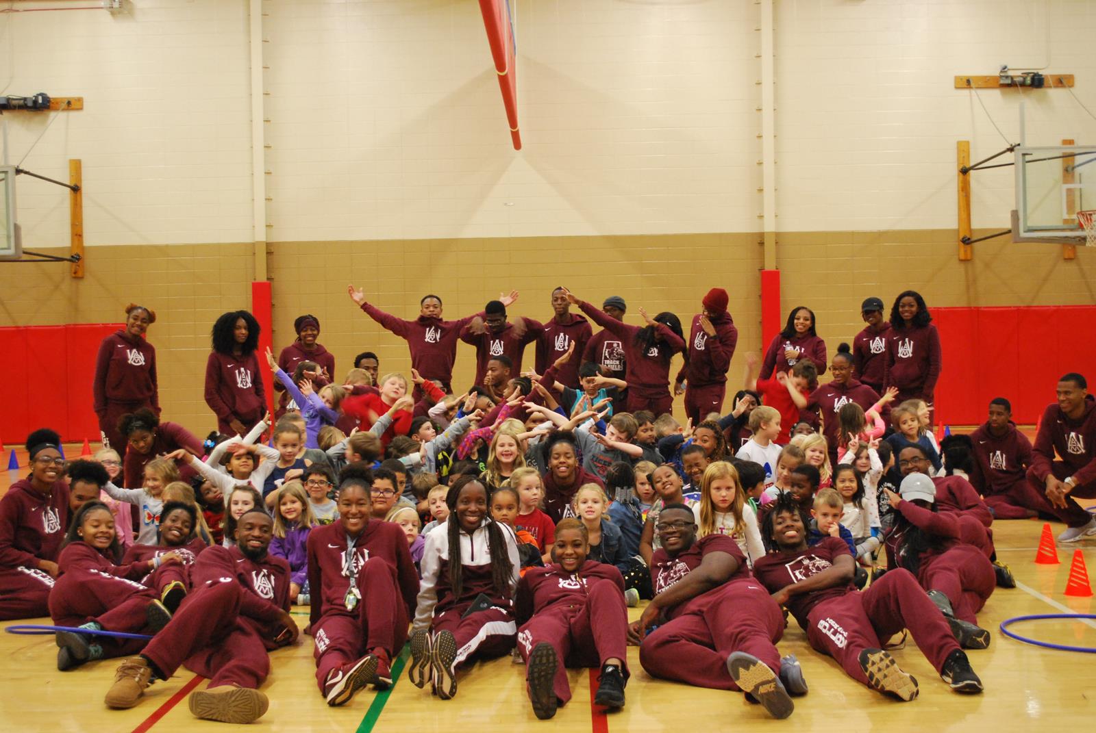 Track and Field athletes visit Challenger Elementary to mentor students ...