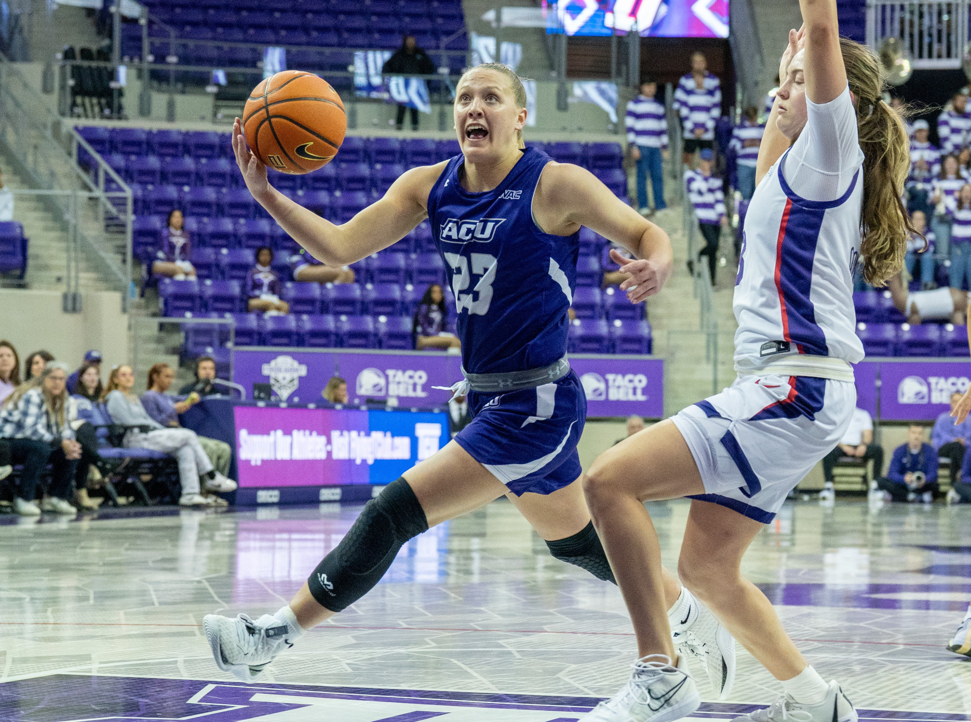 TCU Holds Off Wildcats, 77-60 - Abilene Christian University Athletics