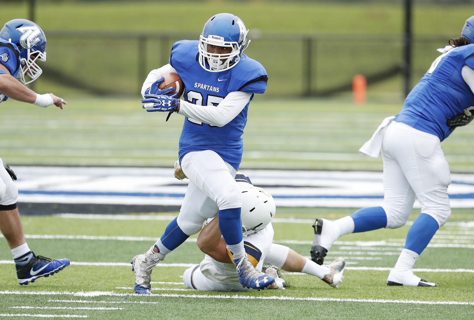 Ground game leads Spartans to out soar Falcons - Aurora University ...