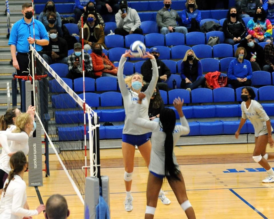 Spartans win two against Cougars in straight sets - Aurora University ...