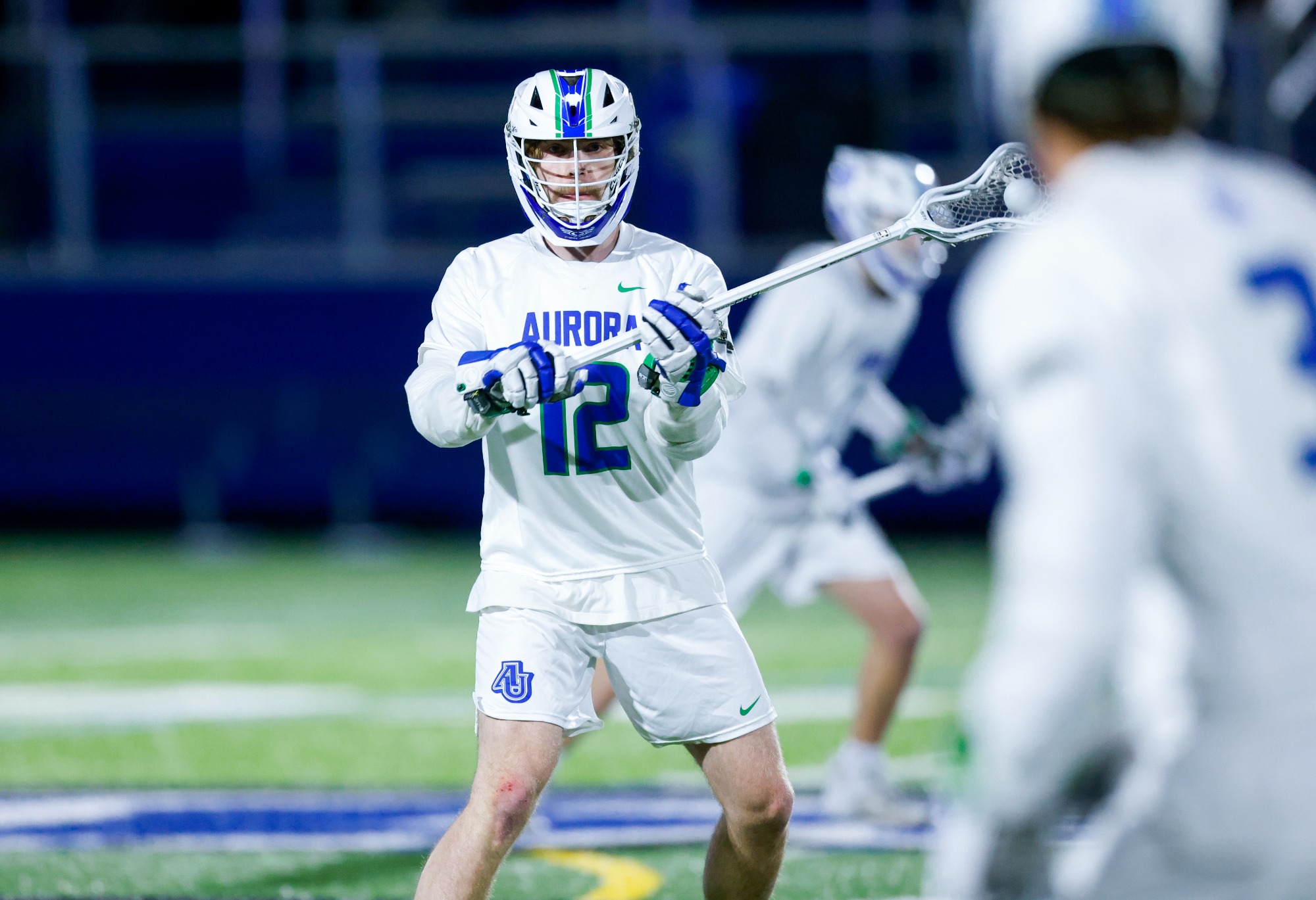 Spartans fall under the lights to Titans - Aurora University Athletics