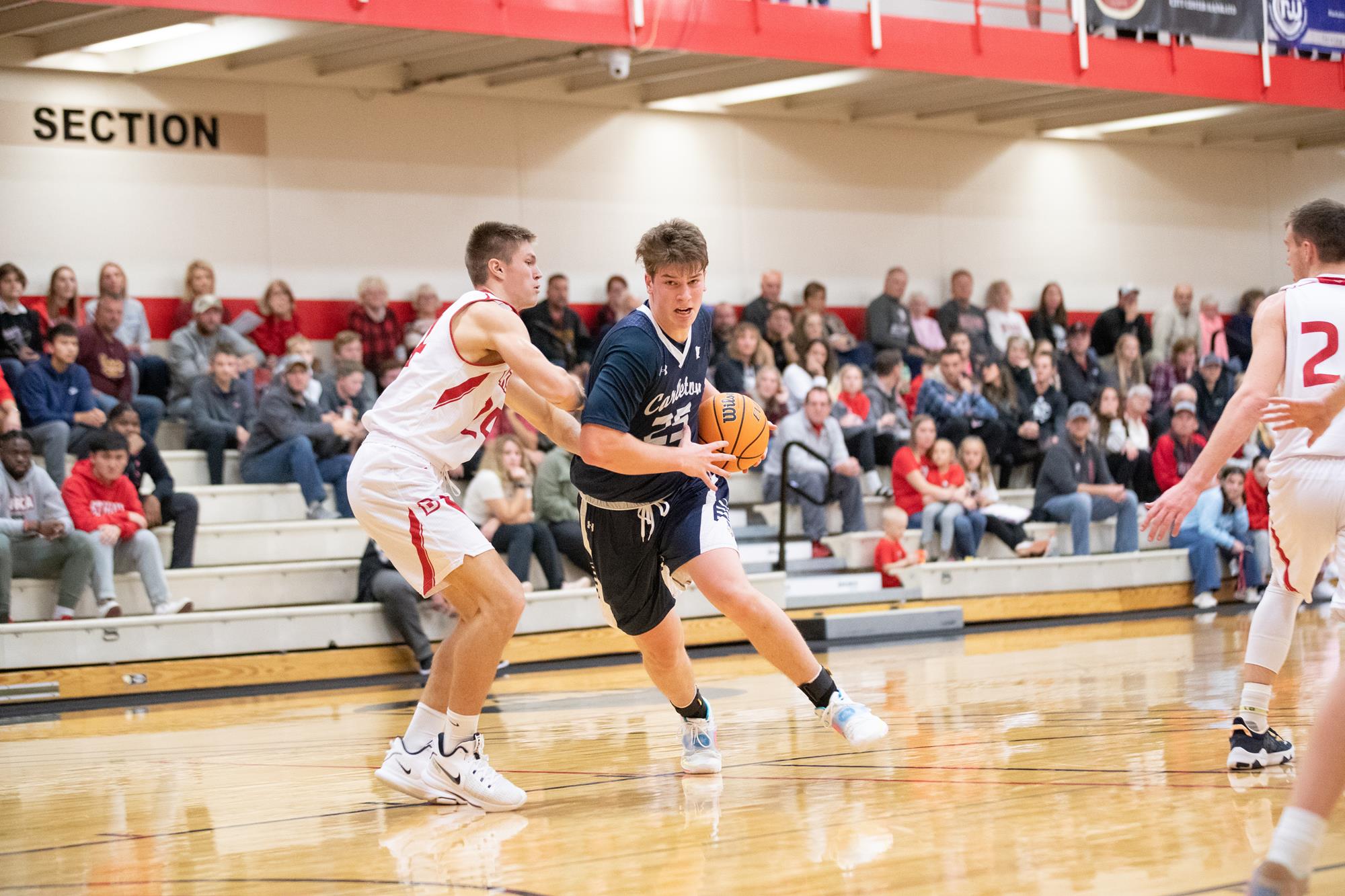 Knights win fifth straight, keep Goat Trophy with 71-65 win at St. Olaf ...