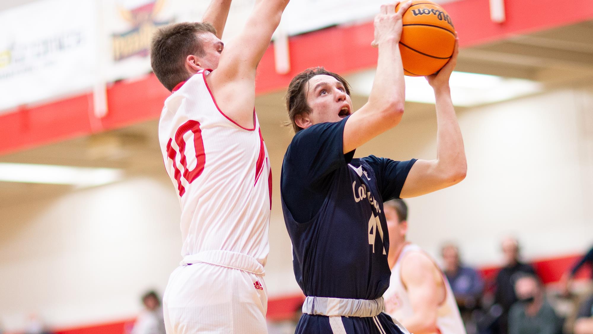 Johnnies shoot their way past short-handed Knights - Carleton College