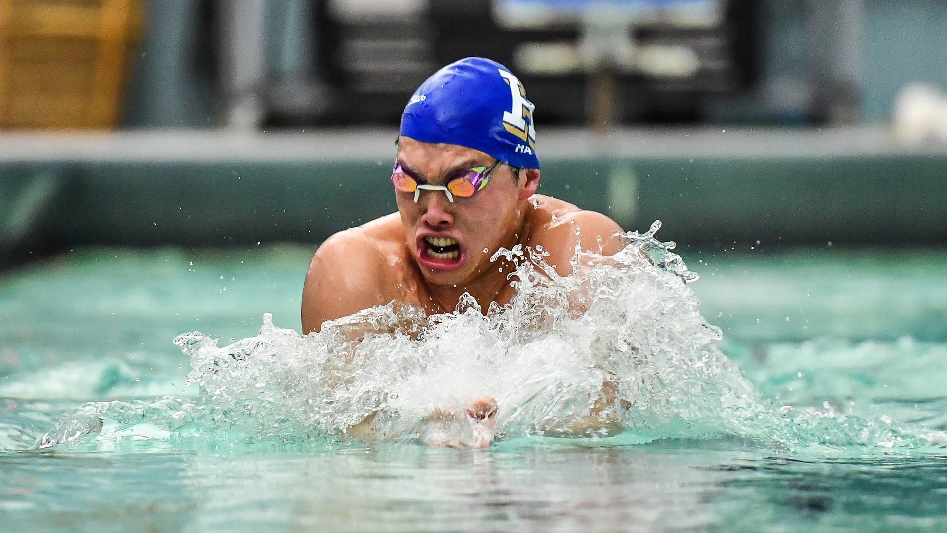 Men's swimmers win three events in dual meet setback at Colgate ...