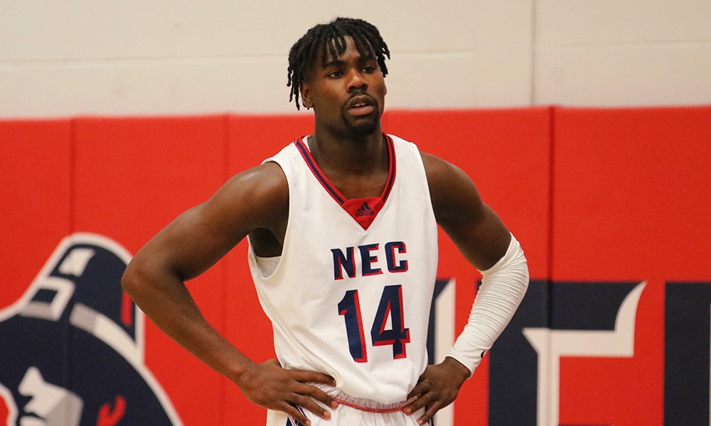 Men’s Basketball Edged by Hornets in Opener - New England College