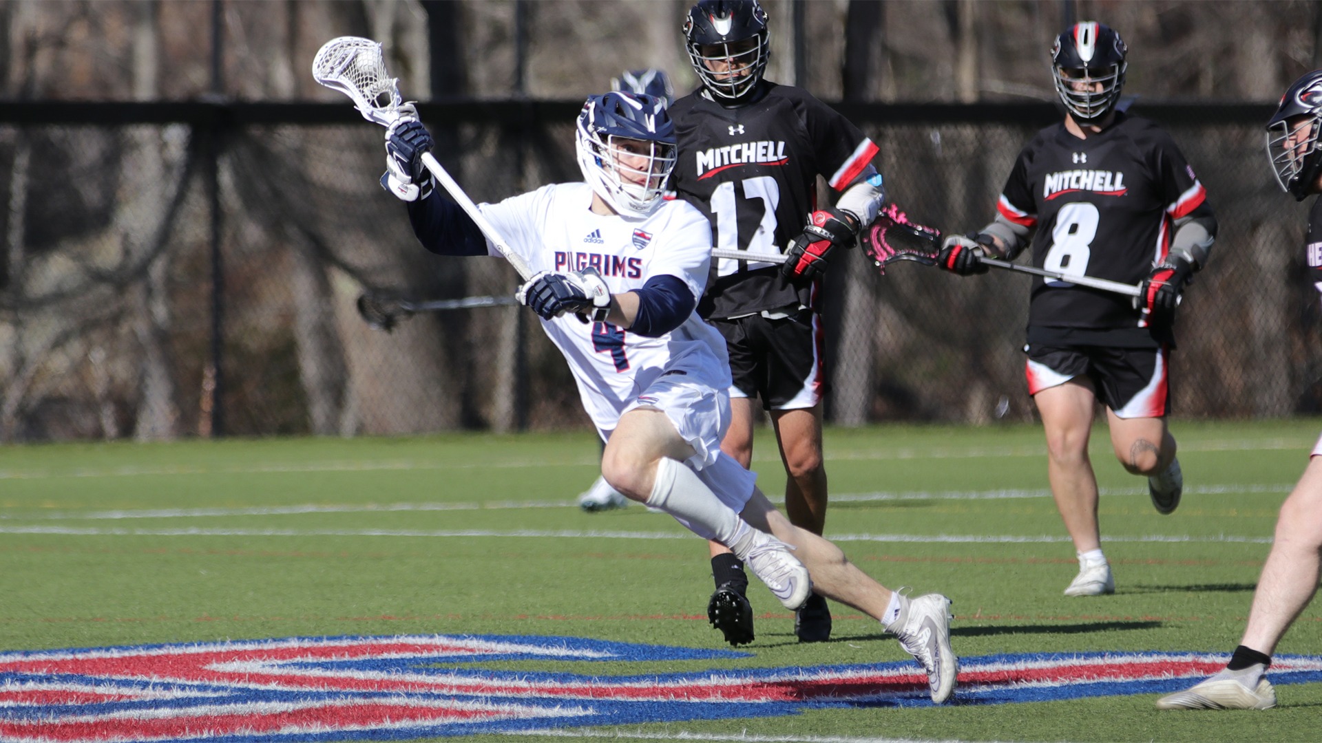 Men’s Lacrosse Can’t Hold Back Emmanuel - New England College