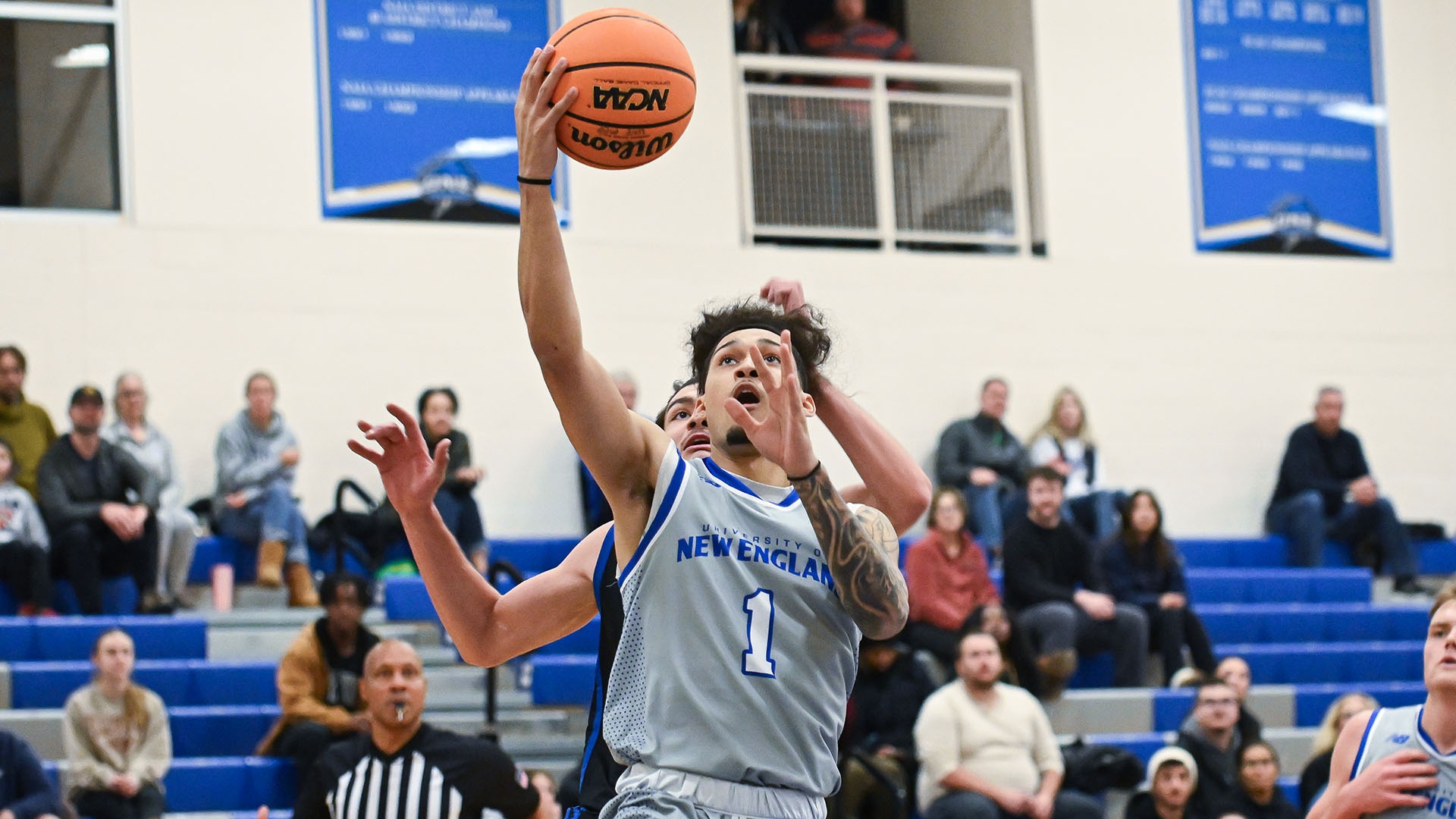 Hawks rally to edge UNE, 63-62 - University of New England Athletics