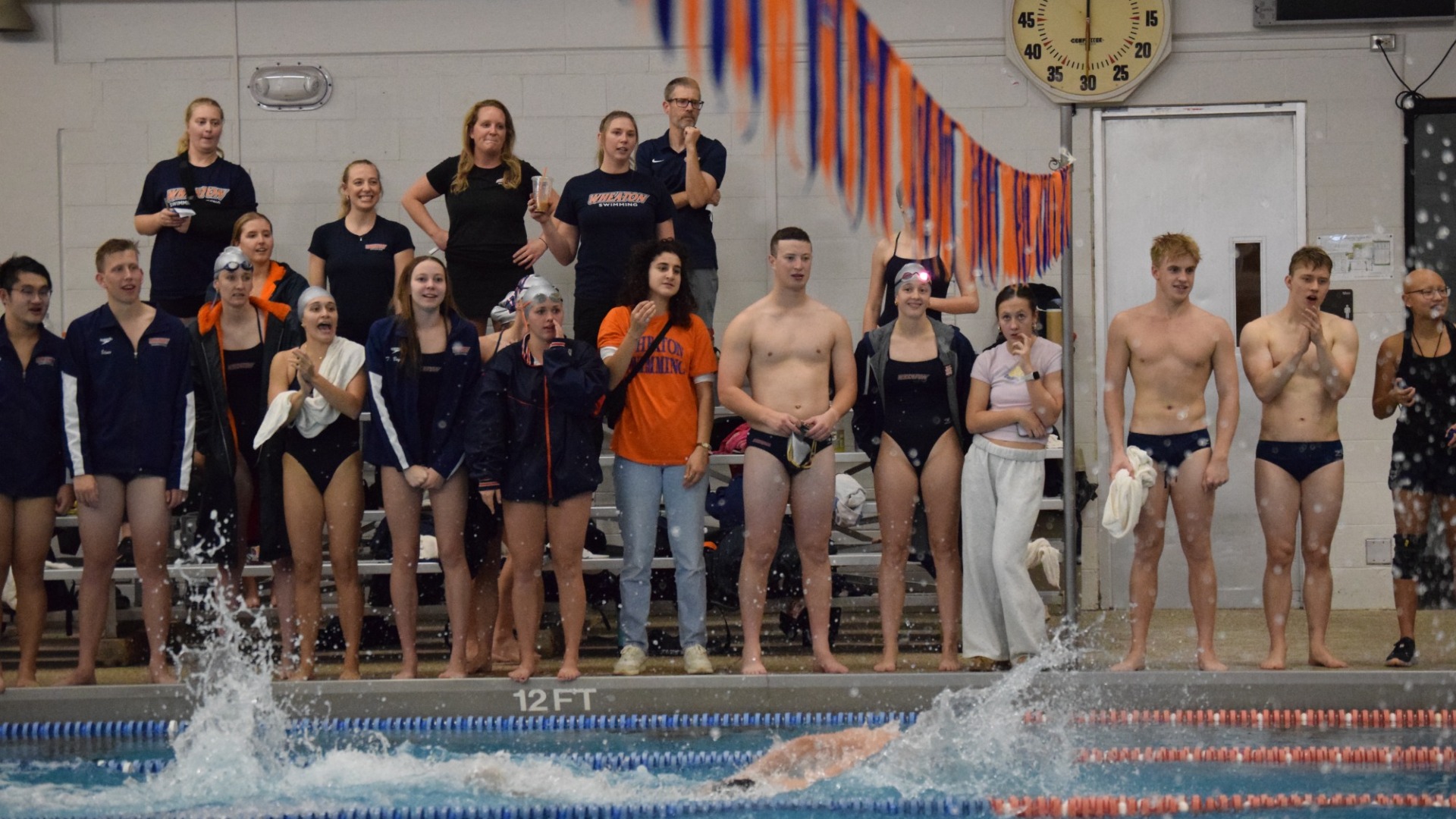 Thunder swim & dive teams travel to Calvin University for dual meet ...