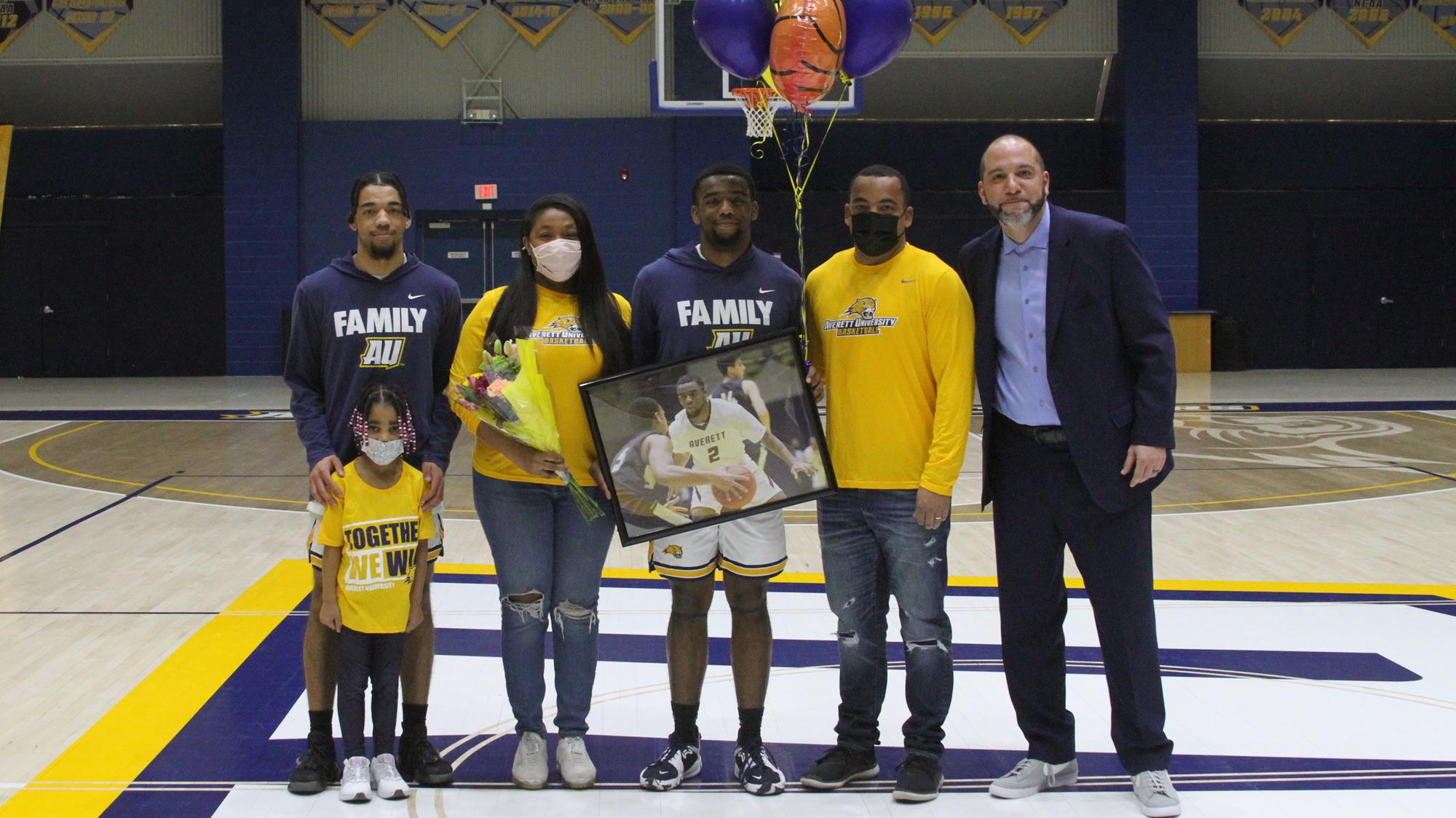 Lewis scores career-high 15 points in men's basketball loss to ...