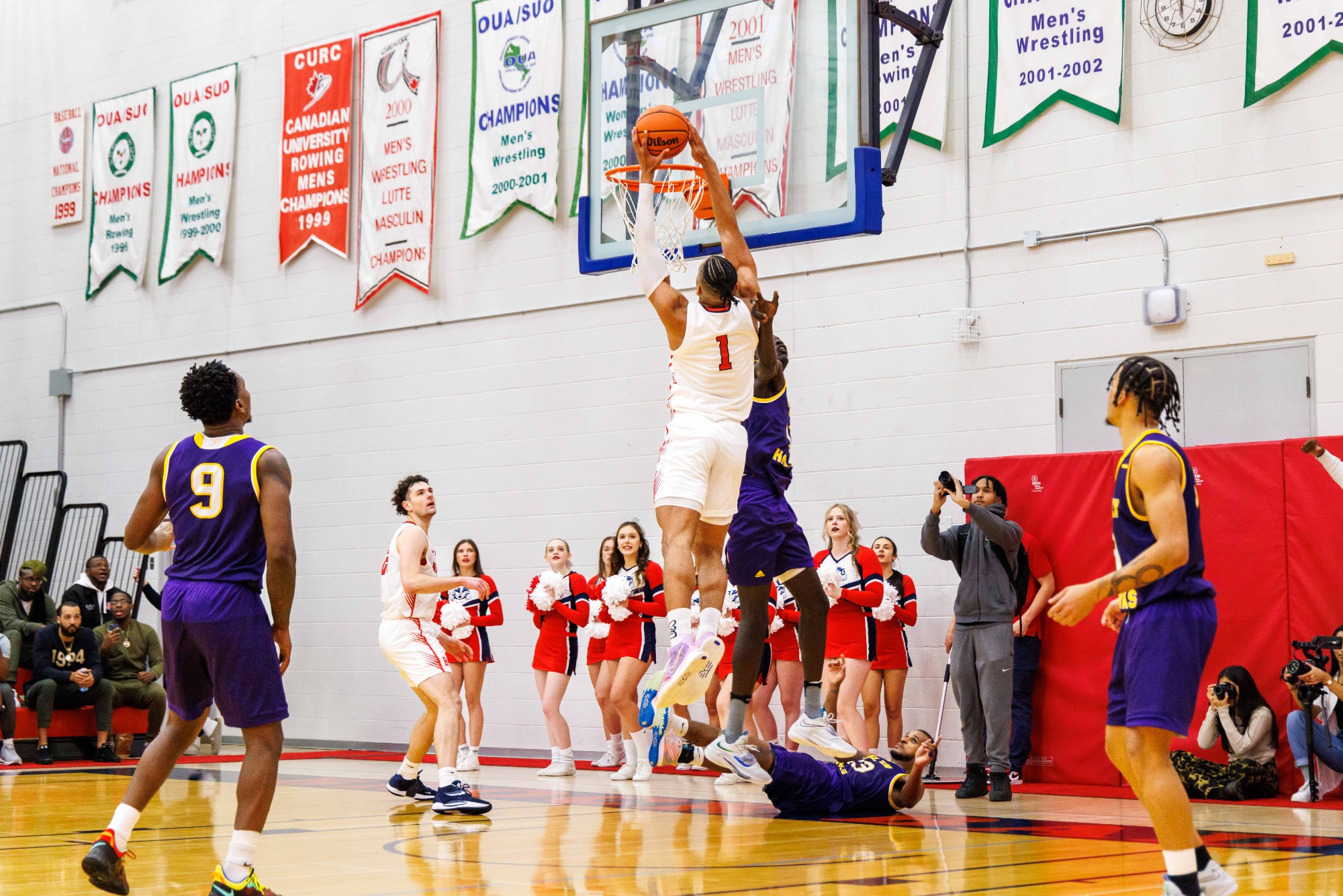 Balanced scoring, defence lift Badgers over Golden Hawks in home opener ...