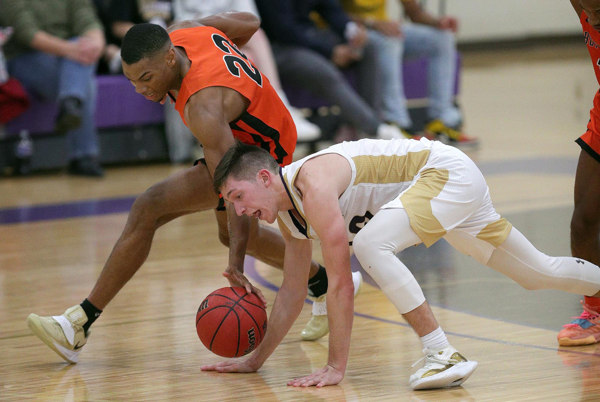 Men’s basketball tops Division II D’Youville 84-75 for first win of ...