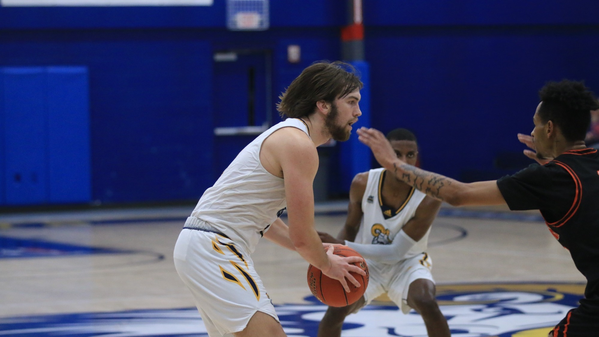 Men's Basketball holds off furious comeback attempt to prevail against ...
