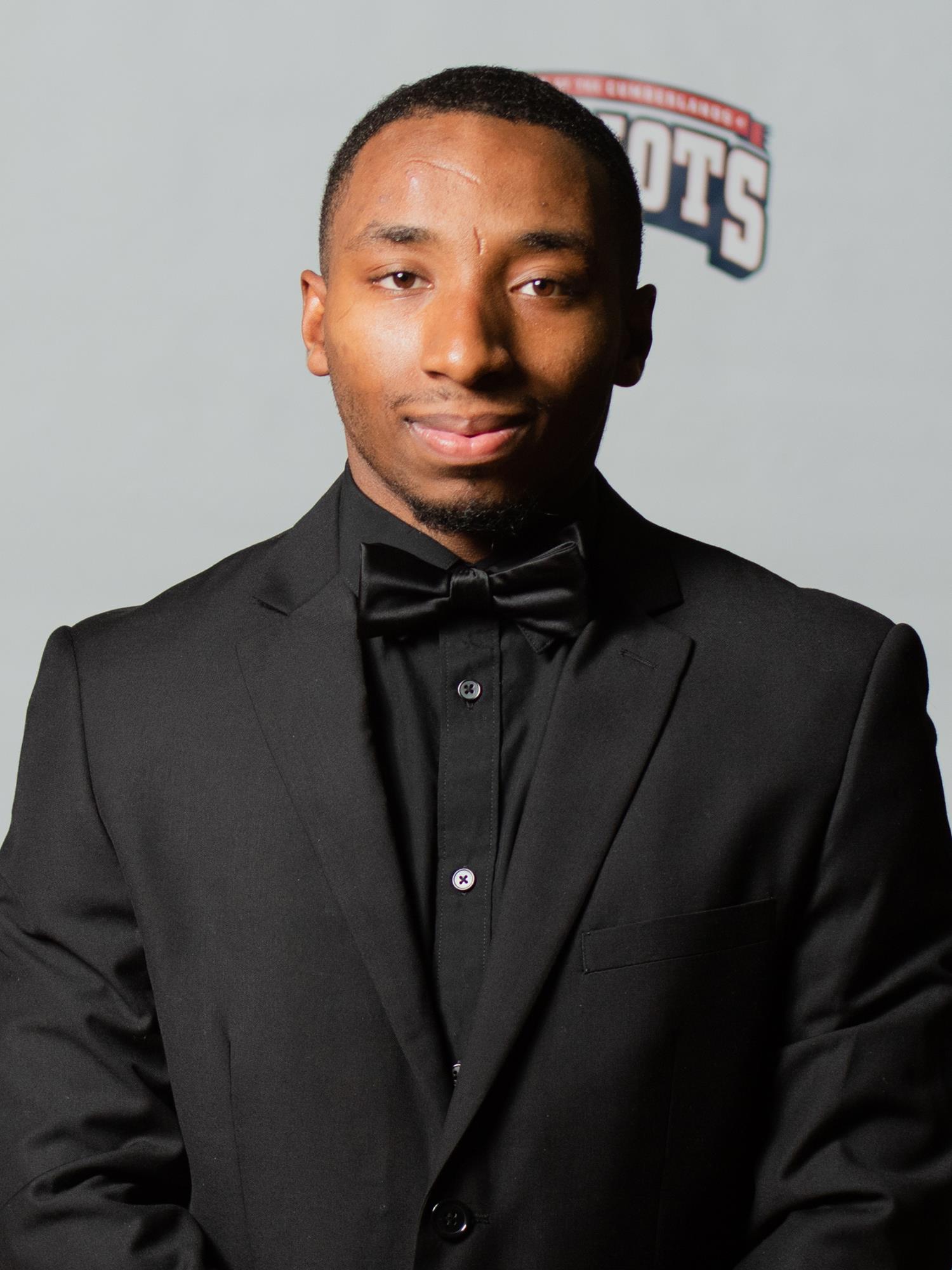 Christian Davis - Men's Track & Field Coach - University of the ...