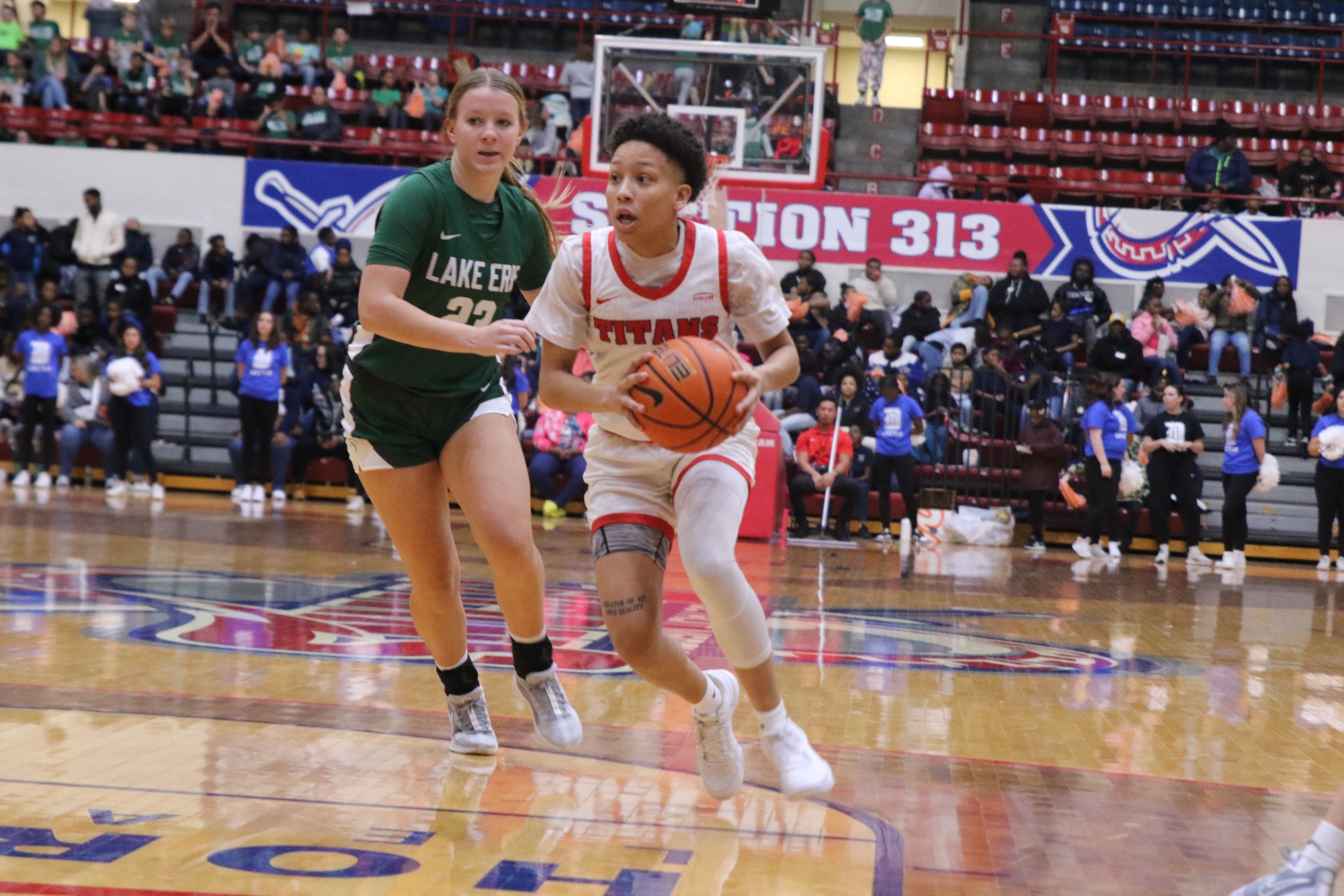 Titans Tame Cougars in Home Opener - University of Detroit Mercy Athletics