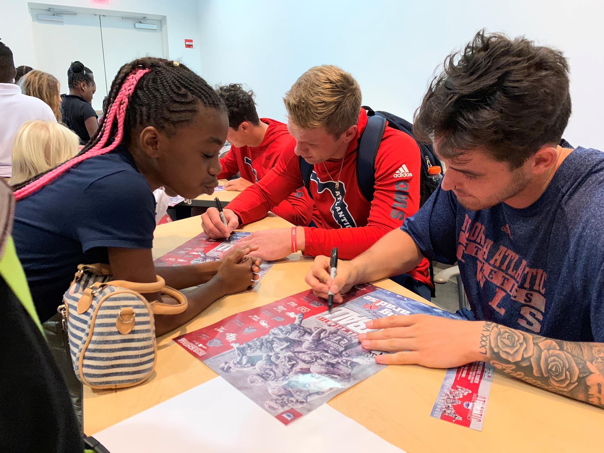 Football Owls Visit Boca Raton Library - Florida Atlantic University ...