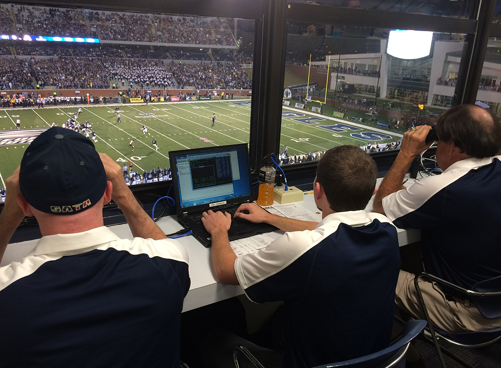 The view from the booth: A night with the GS football stat crew ...