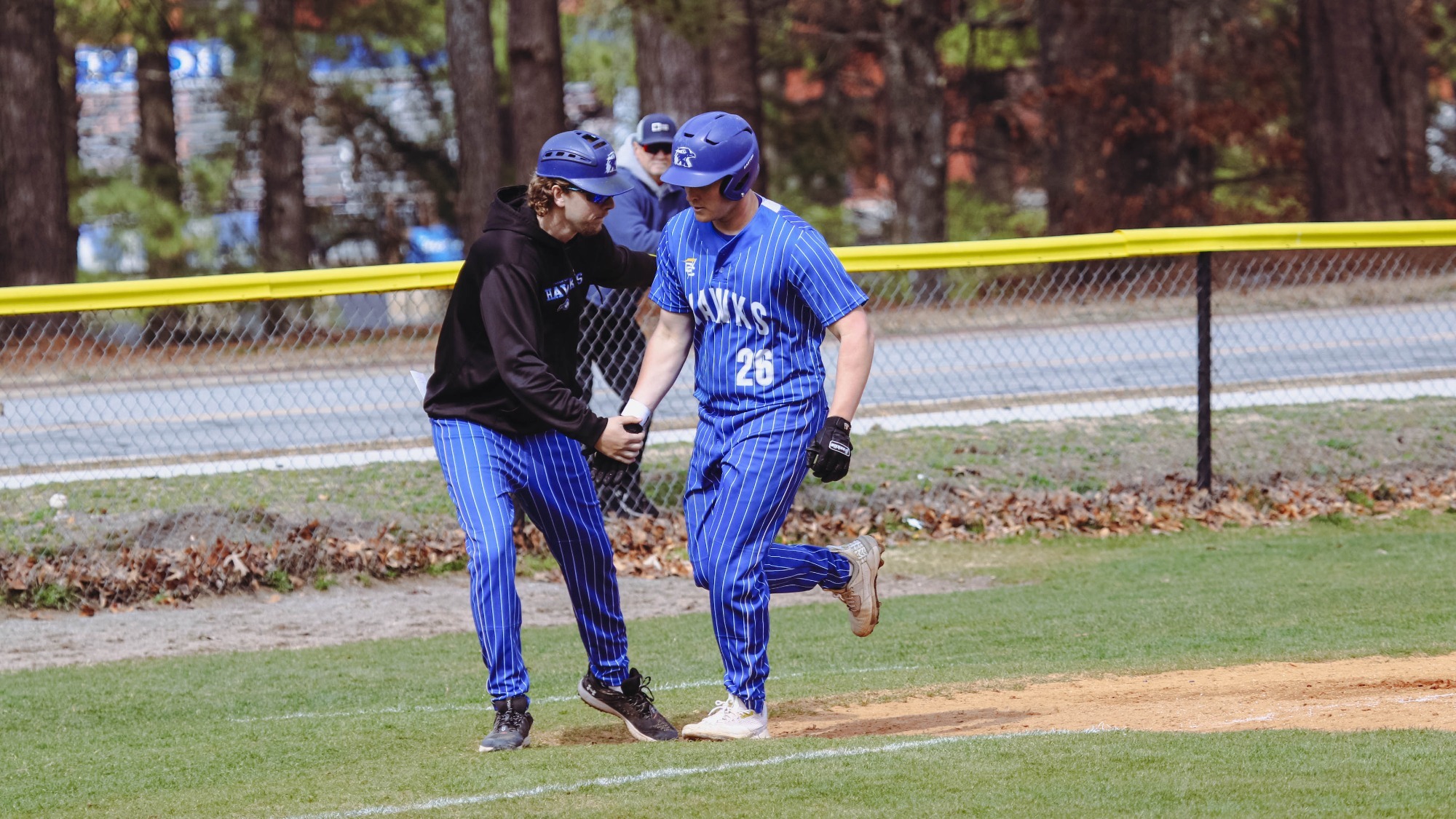Hawks Take League Opener Before Rain - Chowan University Athletics