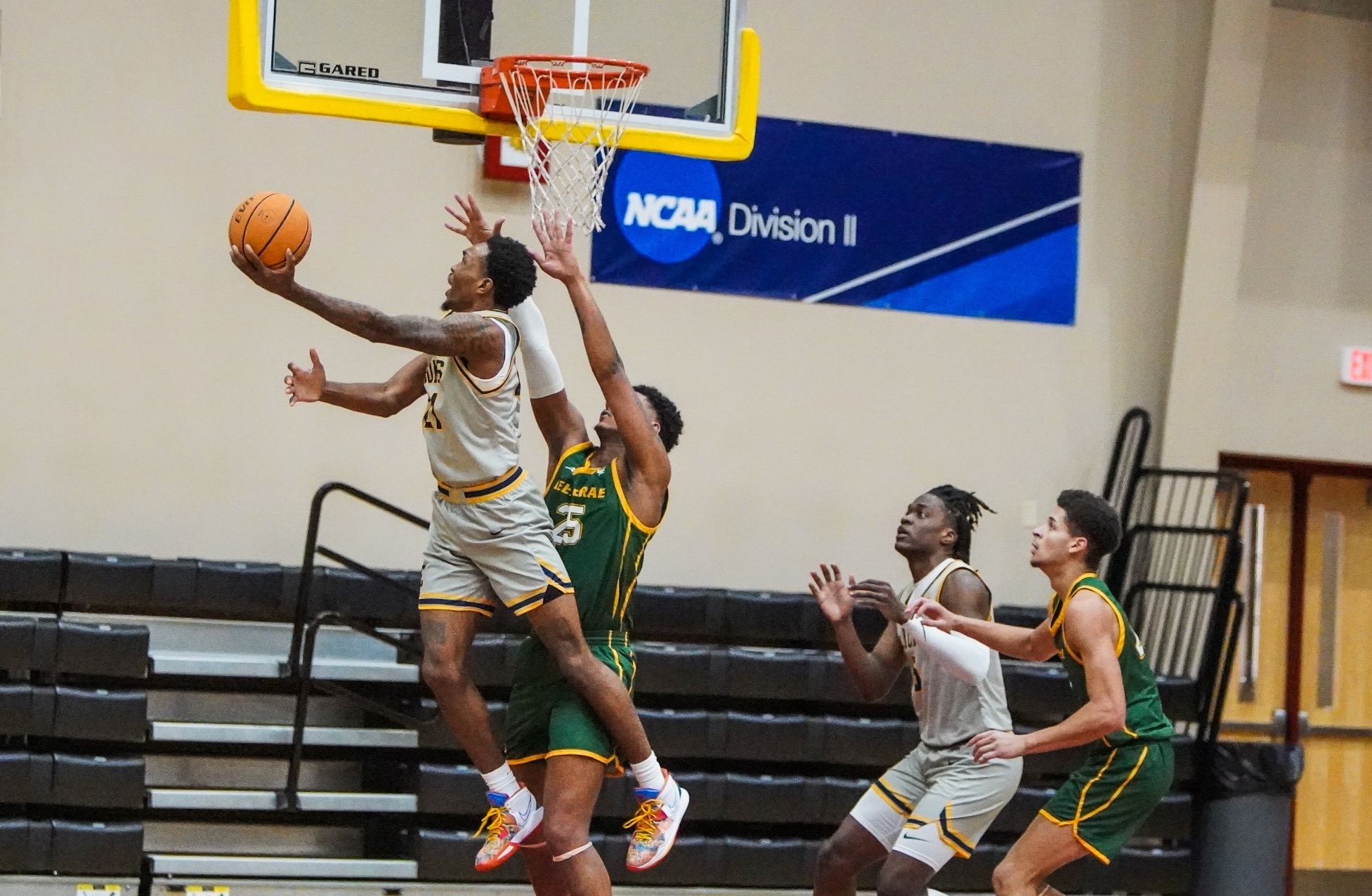 Men's Basketball Dominates Lees-McRa in Conference opener - Emmanuel ...