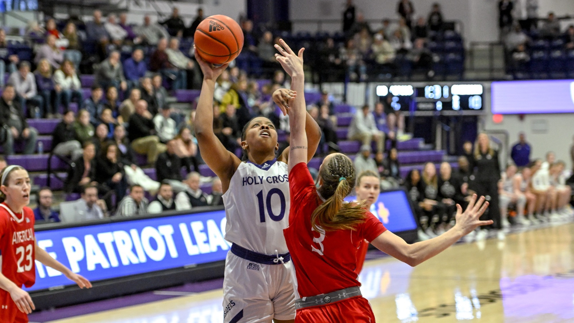 Women’s basketball earns commanding win over American - Holy Cross ...