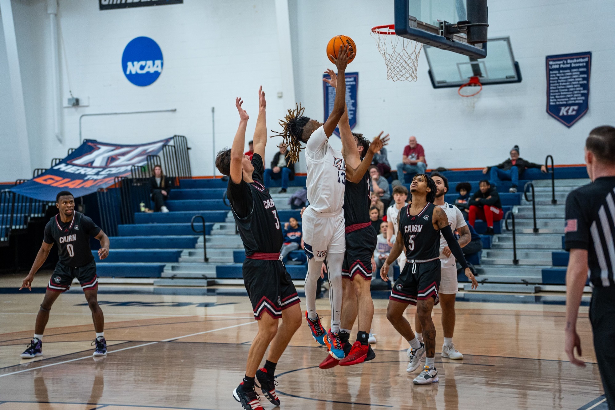 Men’s Basketball Holds Off Highlanders for Fourth Conference Win ...