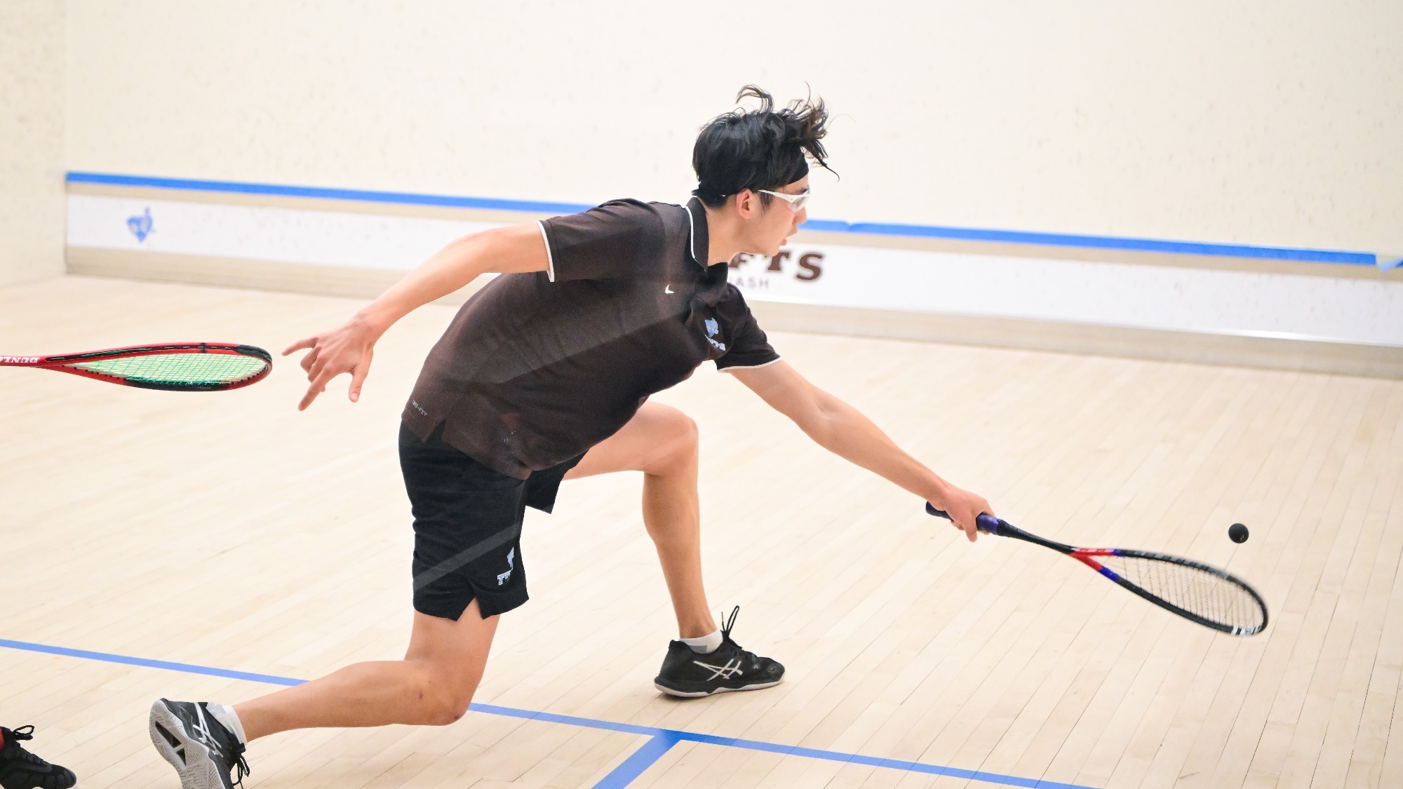 Gill Earns Win as Men's Squash Falls to No.4 Harvard 8-1 - Tufts University