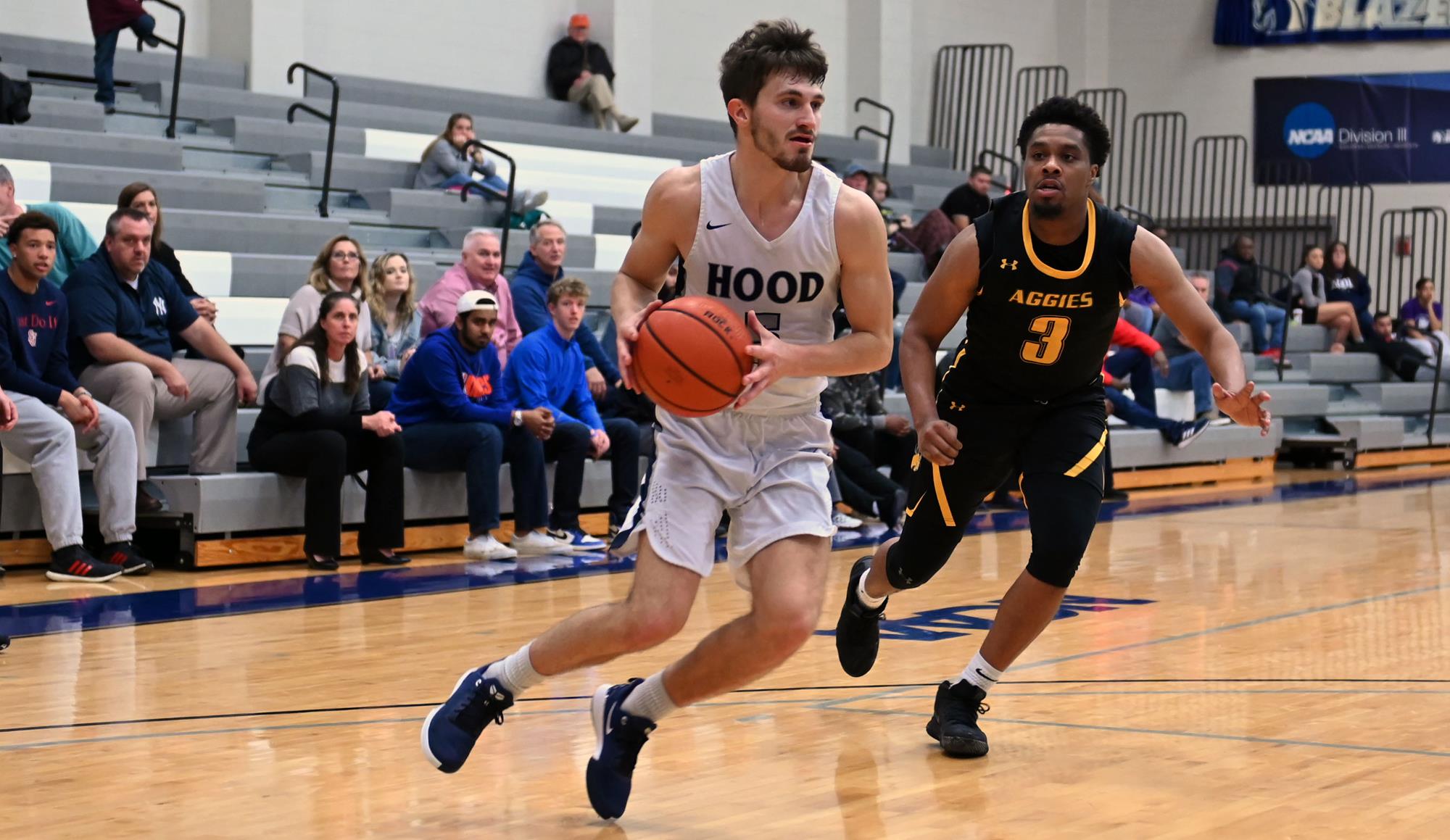 Michael Riley, Evan Wang reach milestones in win - Hood College