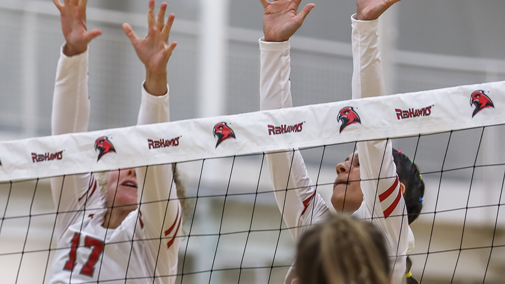 REDHAWKS FALL TO SAINTS IN FOUR SETS - Indiana University Northwest