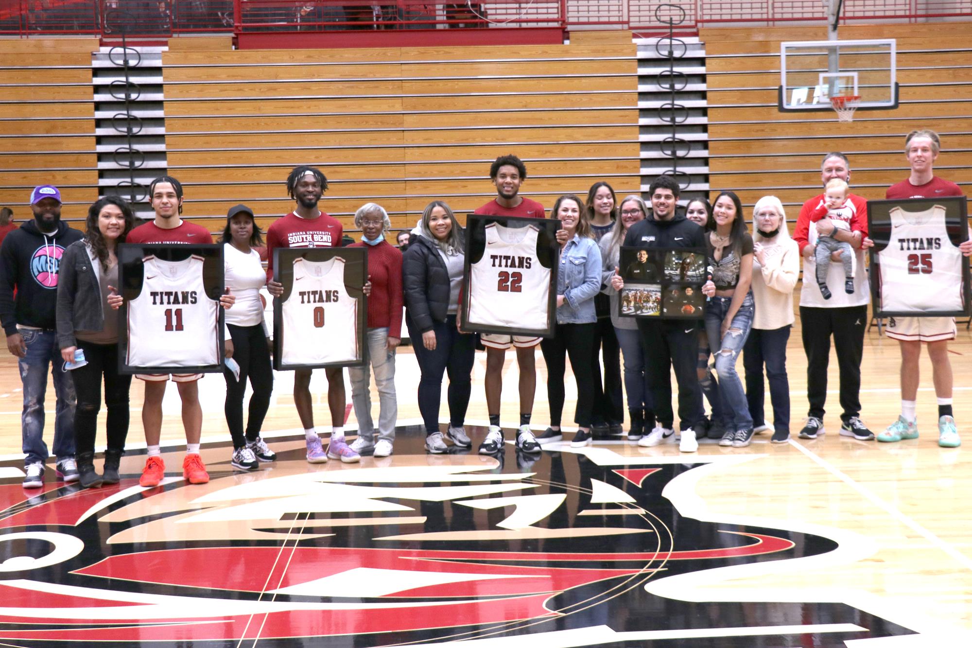 Meredith reaches 1,000 points as #20 Titans win on Senior Day - Indiana ...