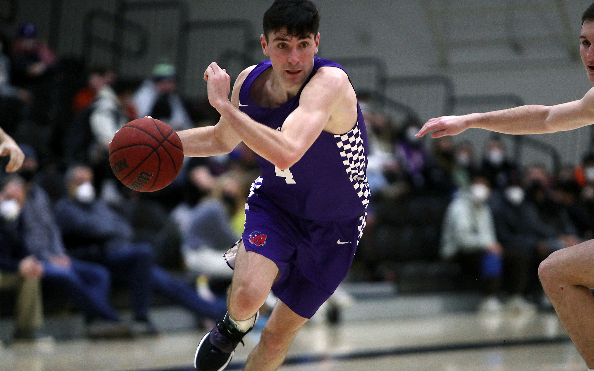 Roggenbuck wins it at the buzzer for Wildcats - Linfield University ...