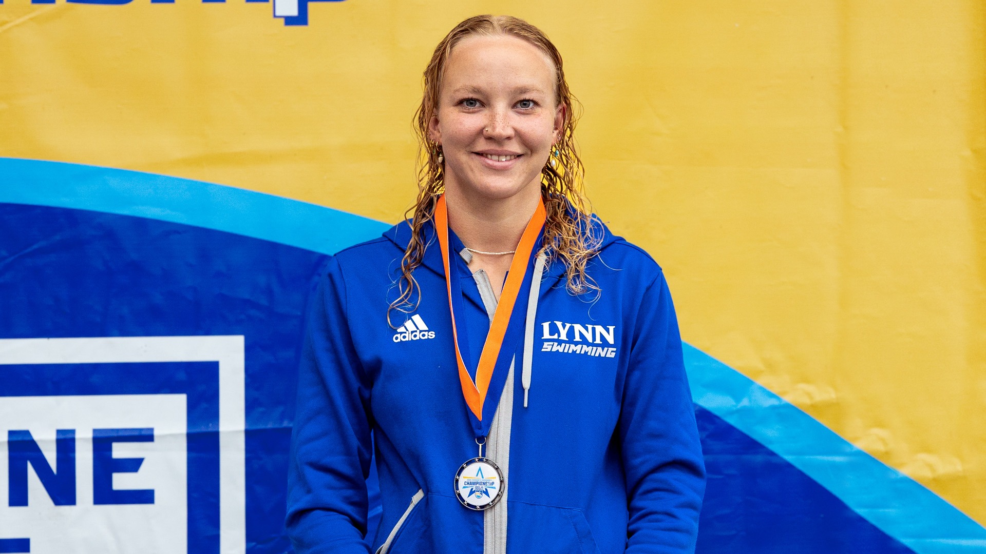 Mertins takes second in 100 butterfly - Lynn University