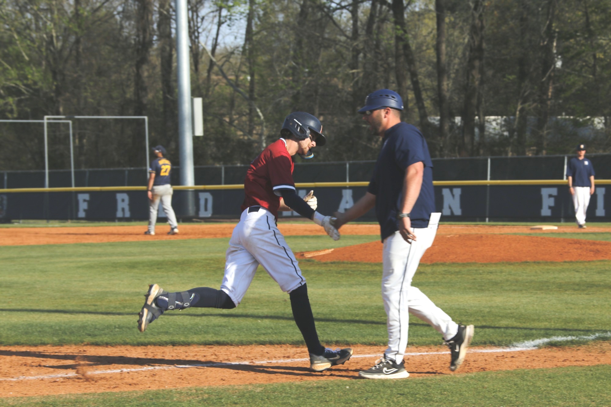 Scots baseball splits double-header with defending SLIAC champion ...