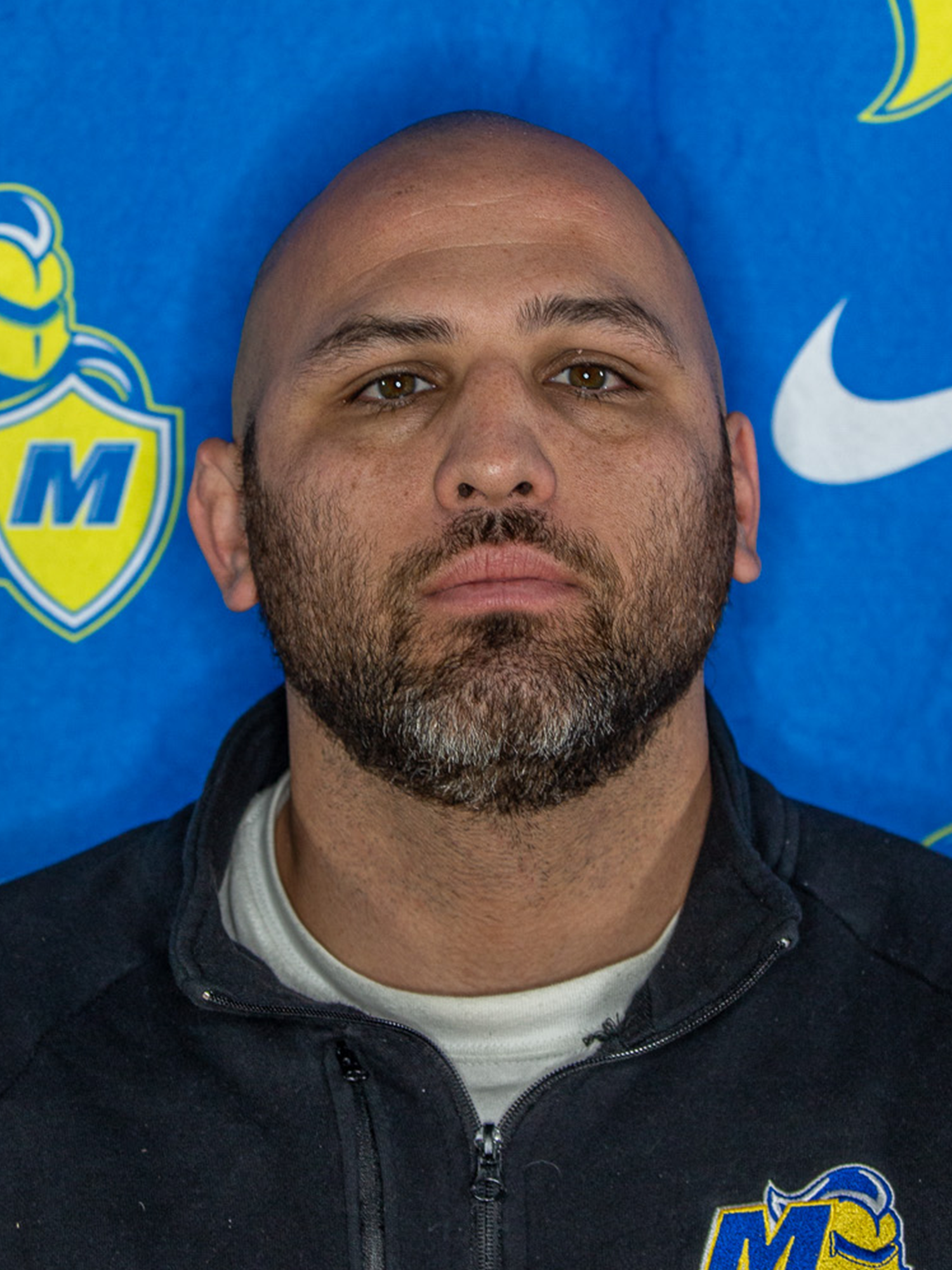 Calvin Sullis - Men's Track and Field Coach - Madonna University Athletics