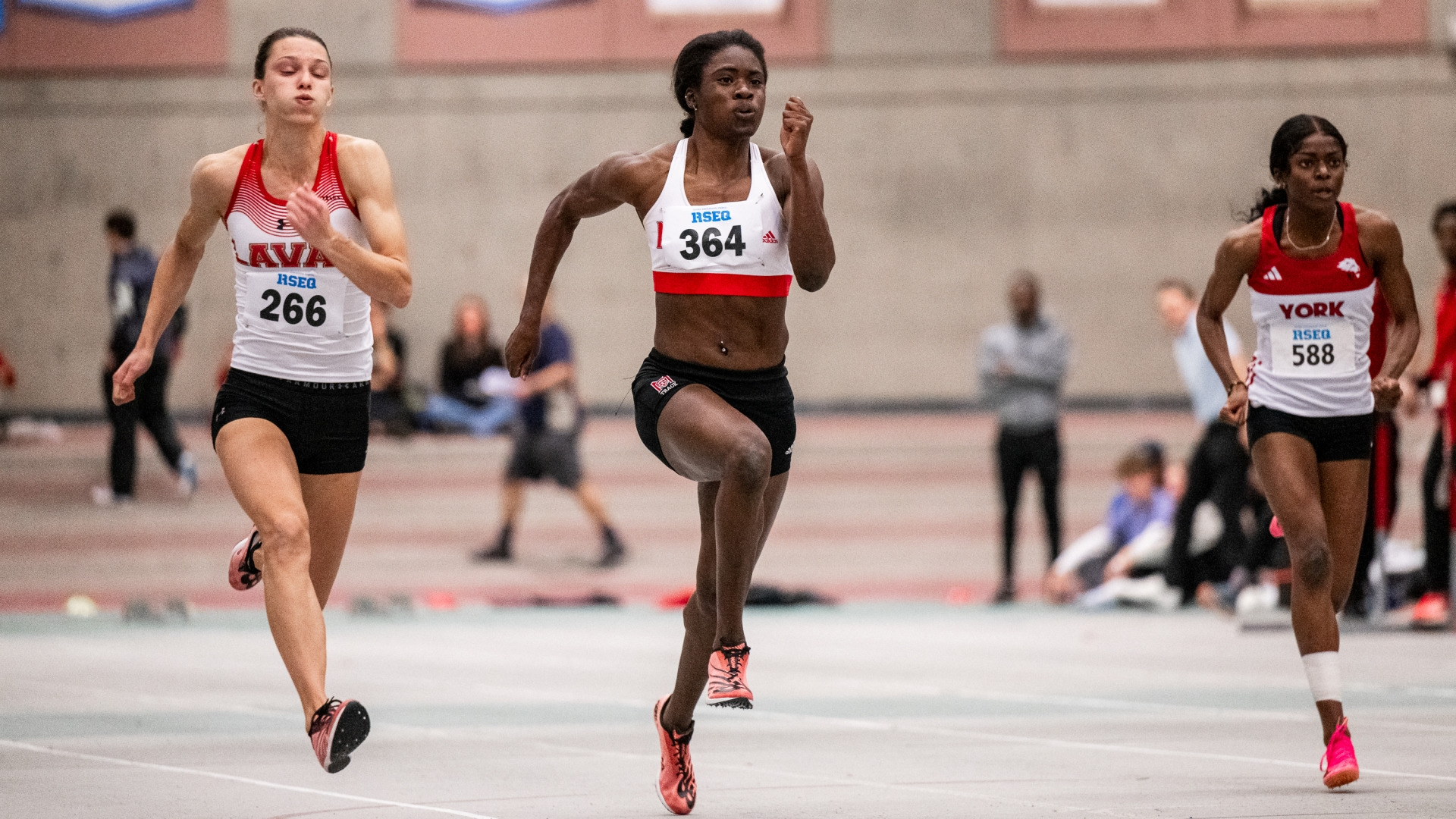 Sprinter Ntambue breaks school record in 60m dash at McGill Team ...