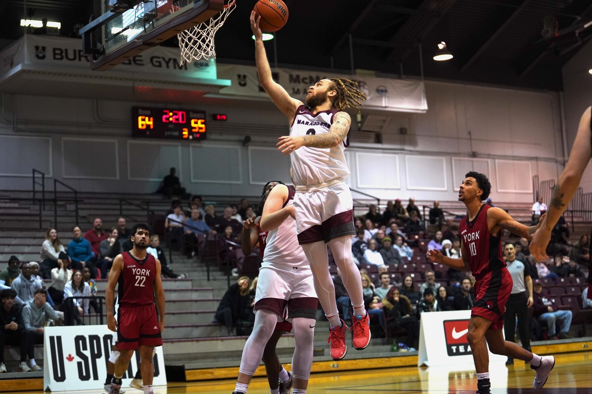 Men's basketball secures road victory over Lions - McMaster University ...