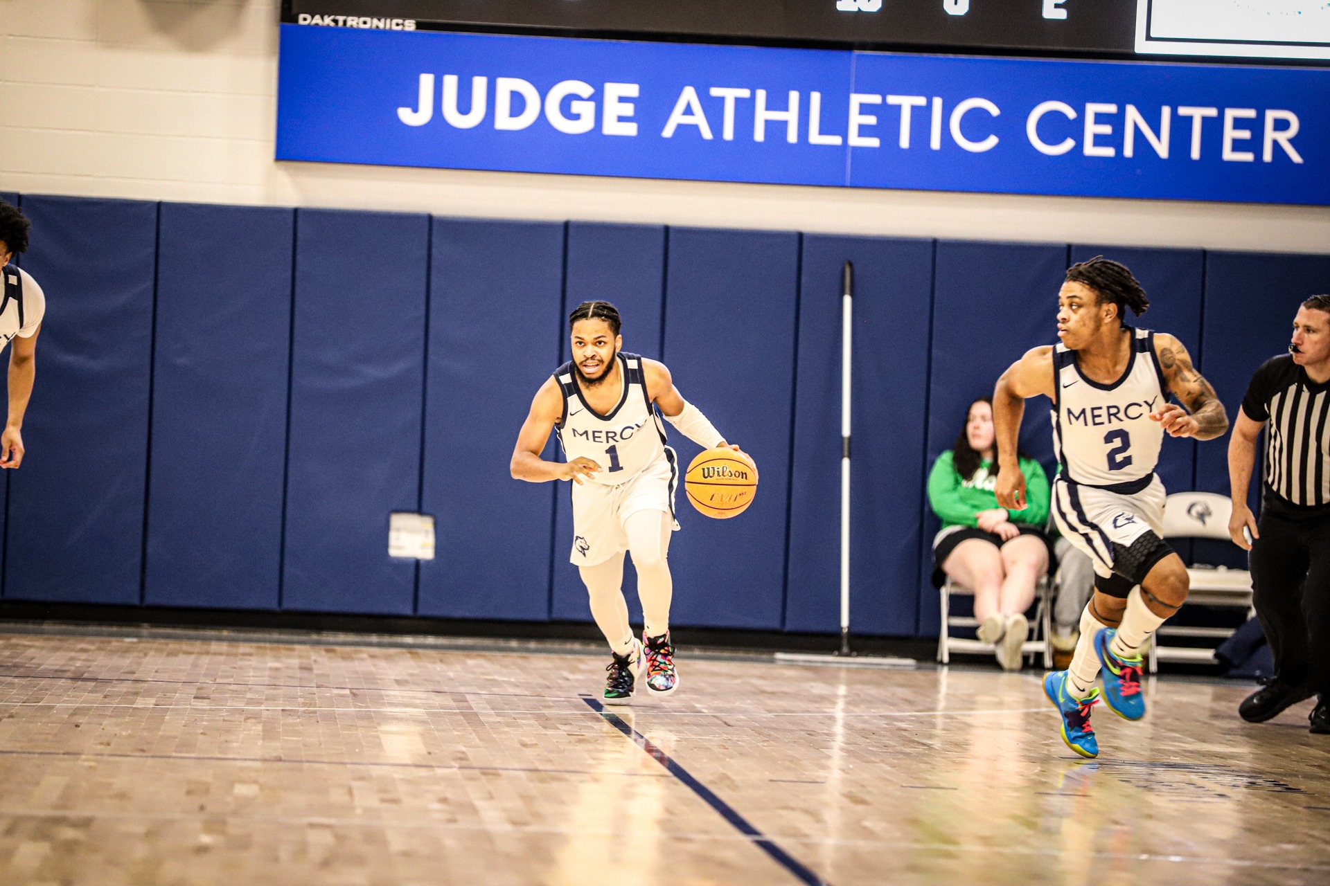May and Chiles Score in Double Figures as Men's Basketball Plays at UDC ...