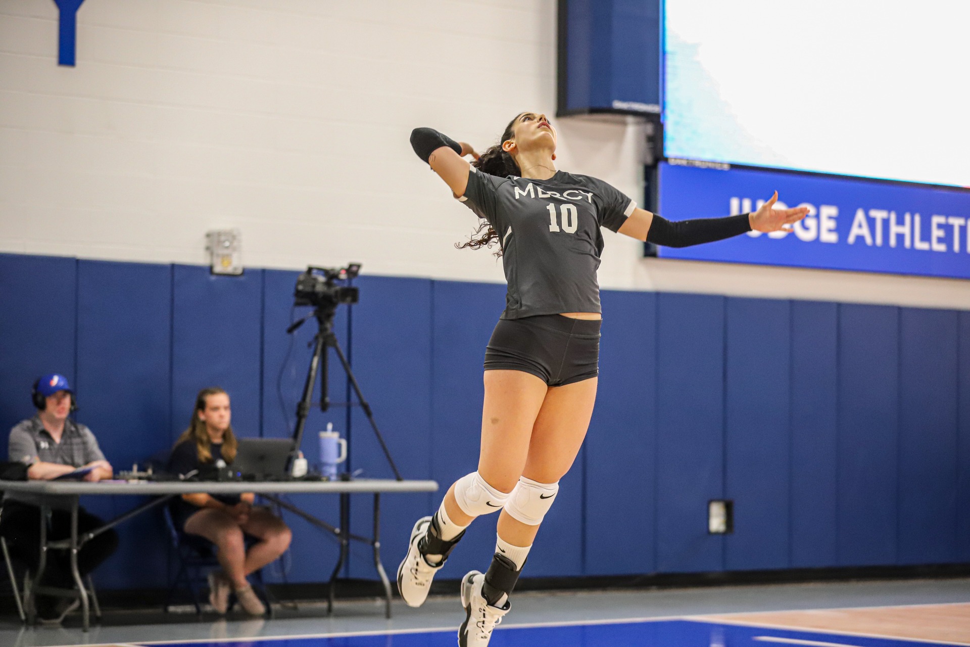 Schneid Records Double-Double as Volleyball Plays at Queens - Mercy ...