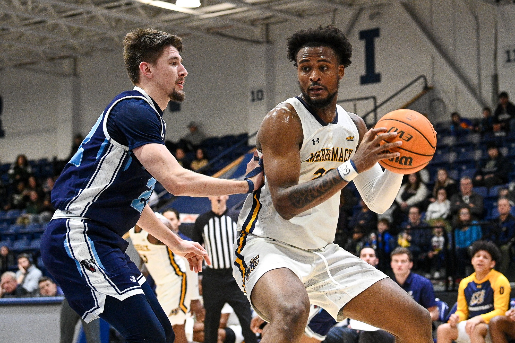 Men's Basketball Edged Out by Maine - Merrimack College Athletics