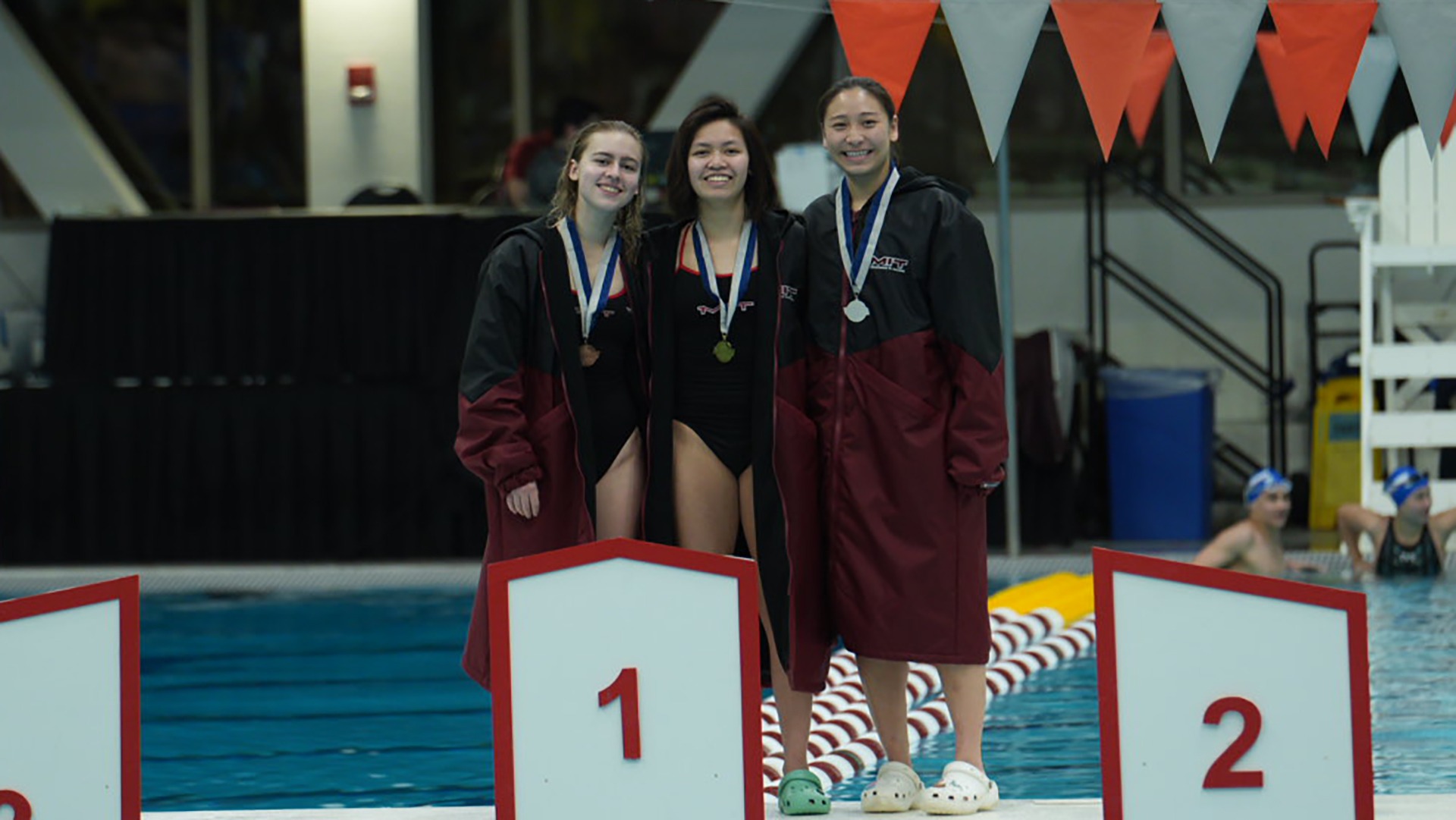 Women's Swim and Dive Sets New Records; Remain In First After Day Two ...