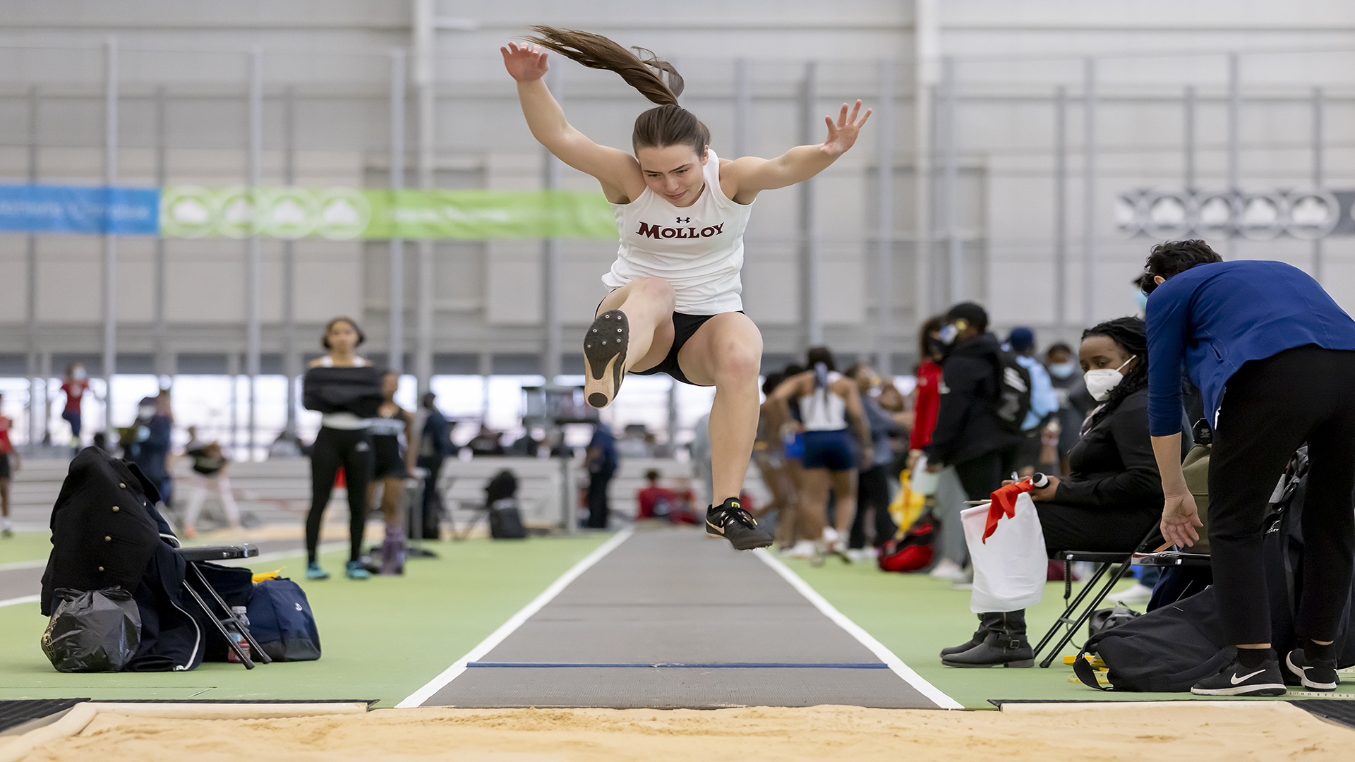 Faith Rousseau - Women's Track and Field - Molloy University Athletics