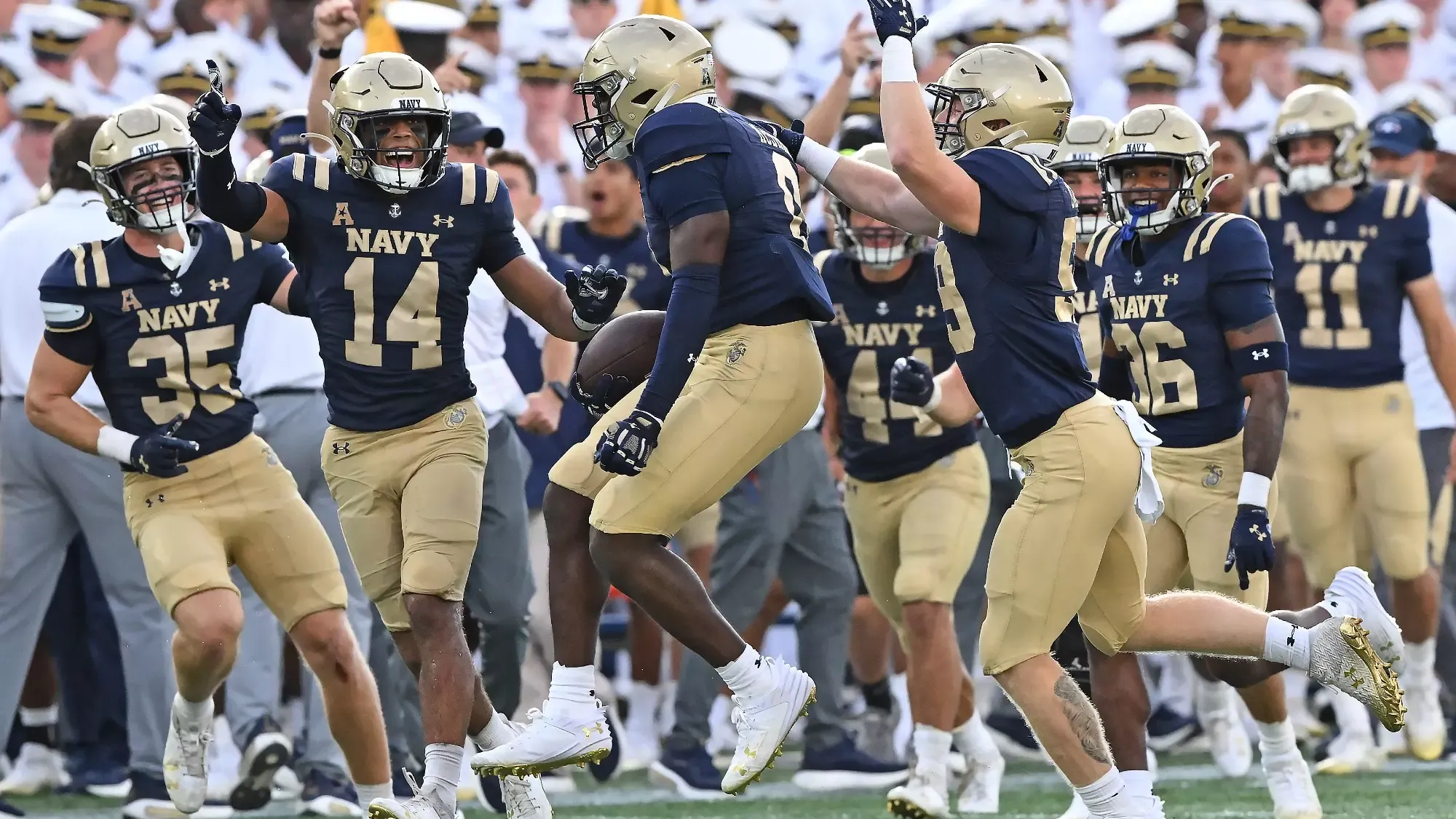 Sophomore quarterback Braxton Woodson and offensive coordinator Drew ...