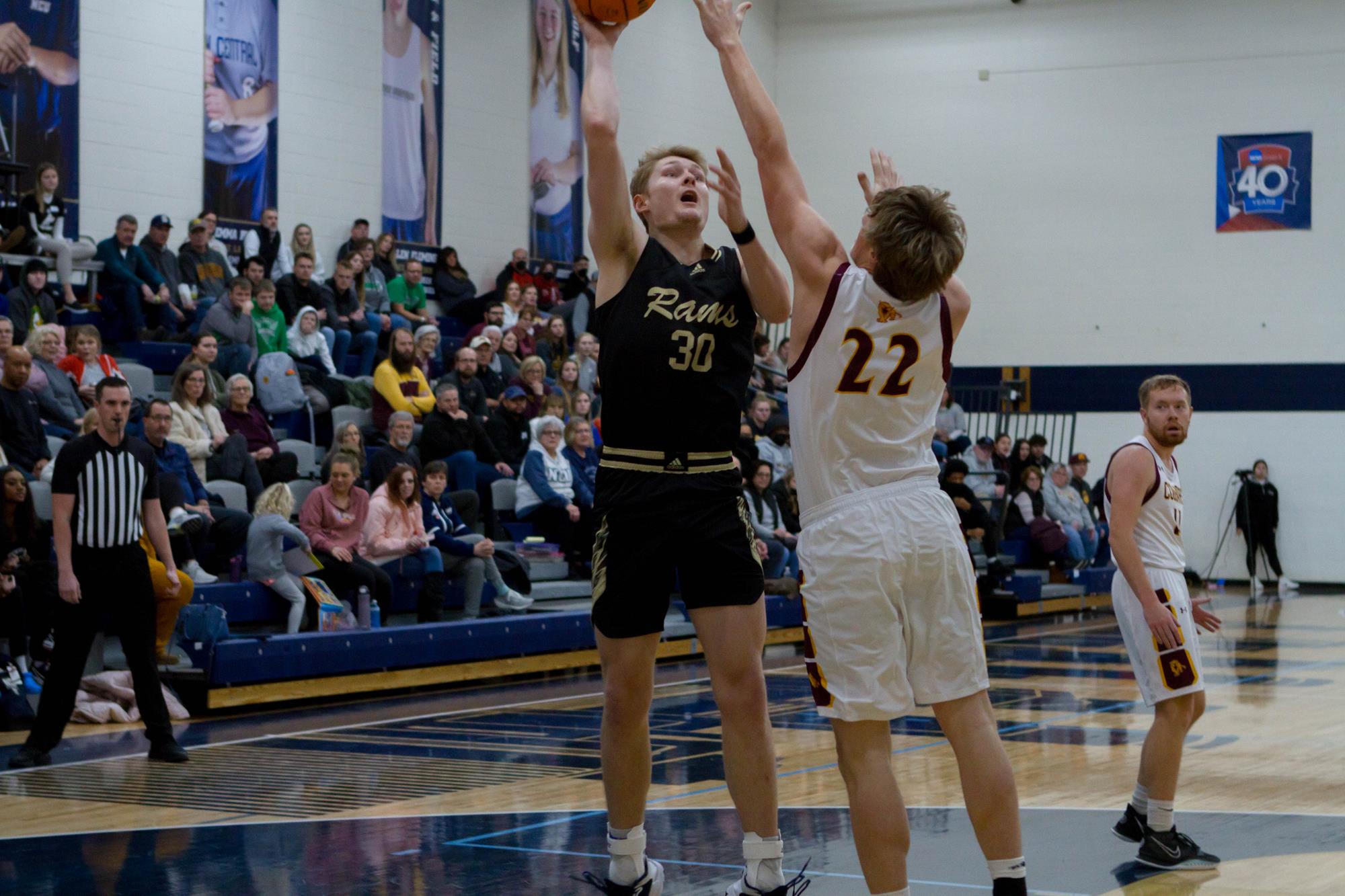 Men's basketball win the thriller over the Knights - North Central ...