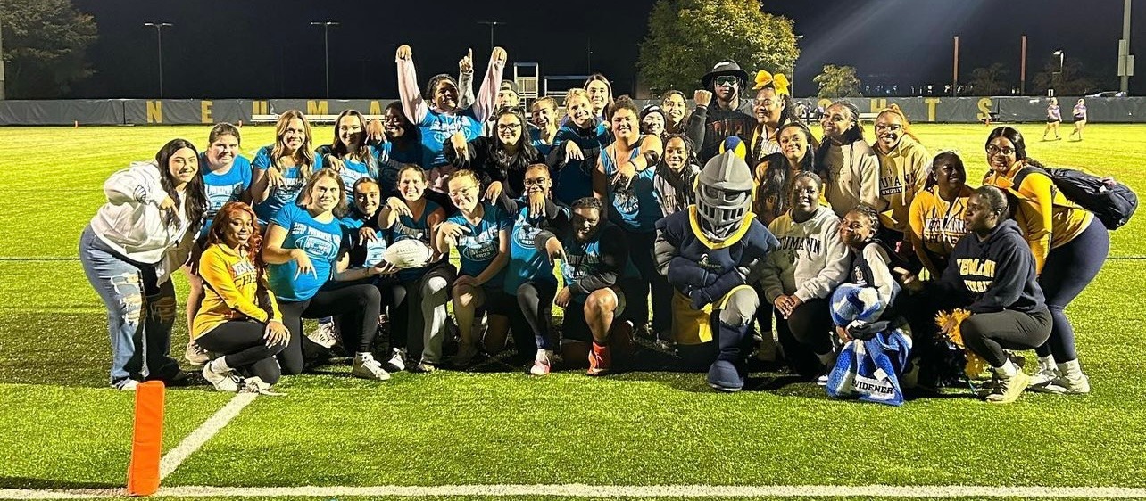 Alumna returns to coach flag football - Neumann University Athletics