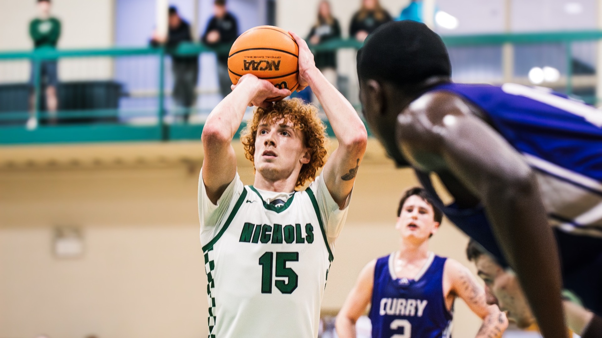 Team Effort Drives Bison to 84-67 Win Over Curry - Nichols College ...