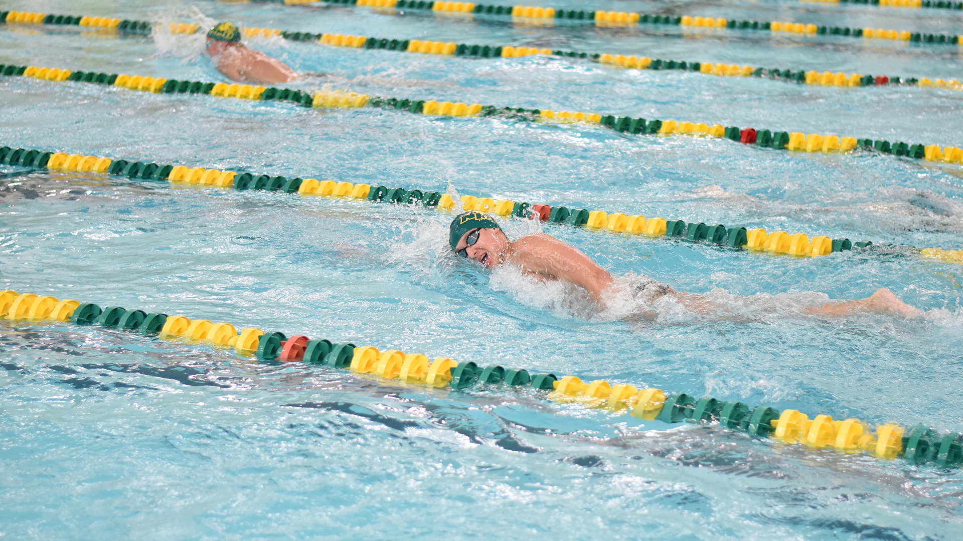 Wildcats Swim to Victory in UWGB’s Pool - Northern Michigan University