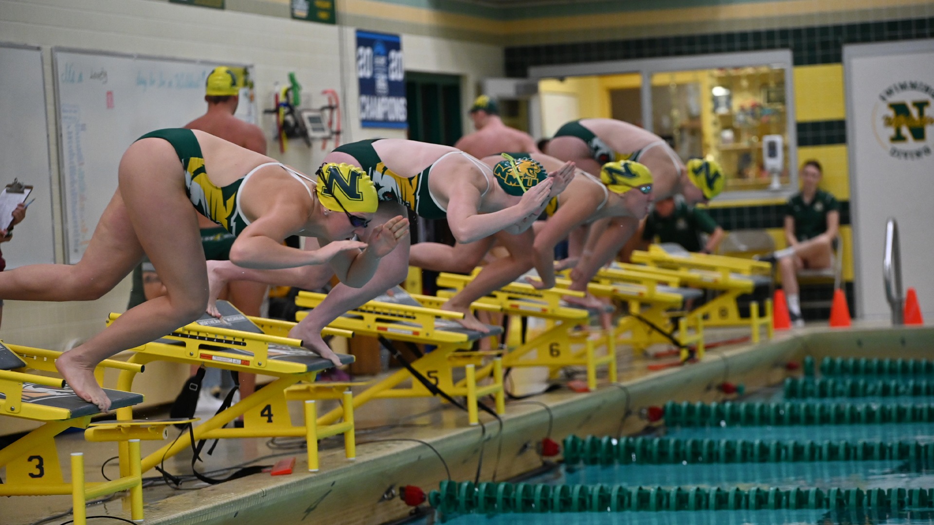 Battle of Green vs. Gold Hits the PEIF Pool - Northern Michigan University