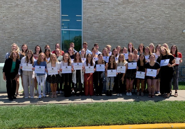 Hawks induct new class of 65 into Chi Alpha Sigma - Rockhurst ...