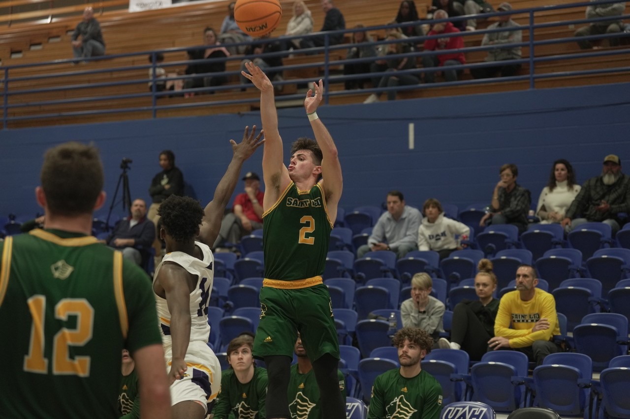 Late Clutch Baskets Lift Lions over #13 Eagles - Saint Leo University ...