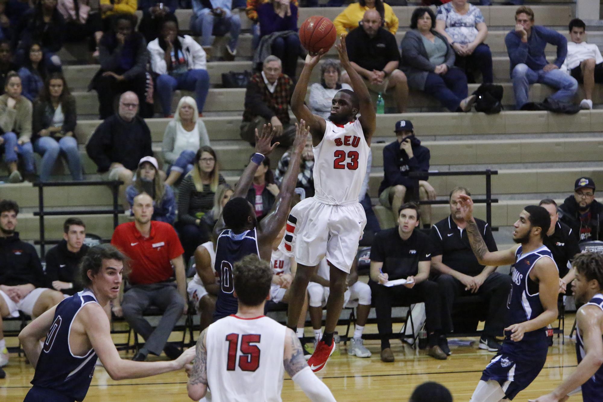 Men’s Basketball Clinches Bye with Crucial Win - Southeastern ...