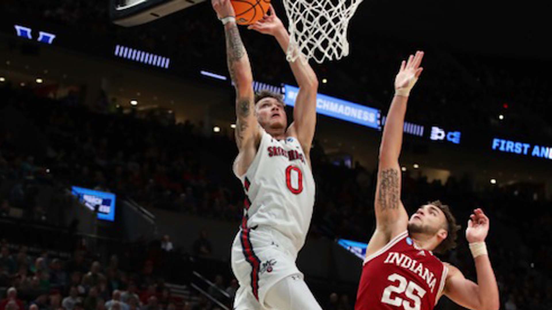 Logan Johnson - Men's Basketball - SMC California Athletics
