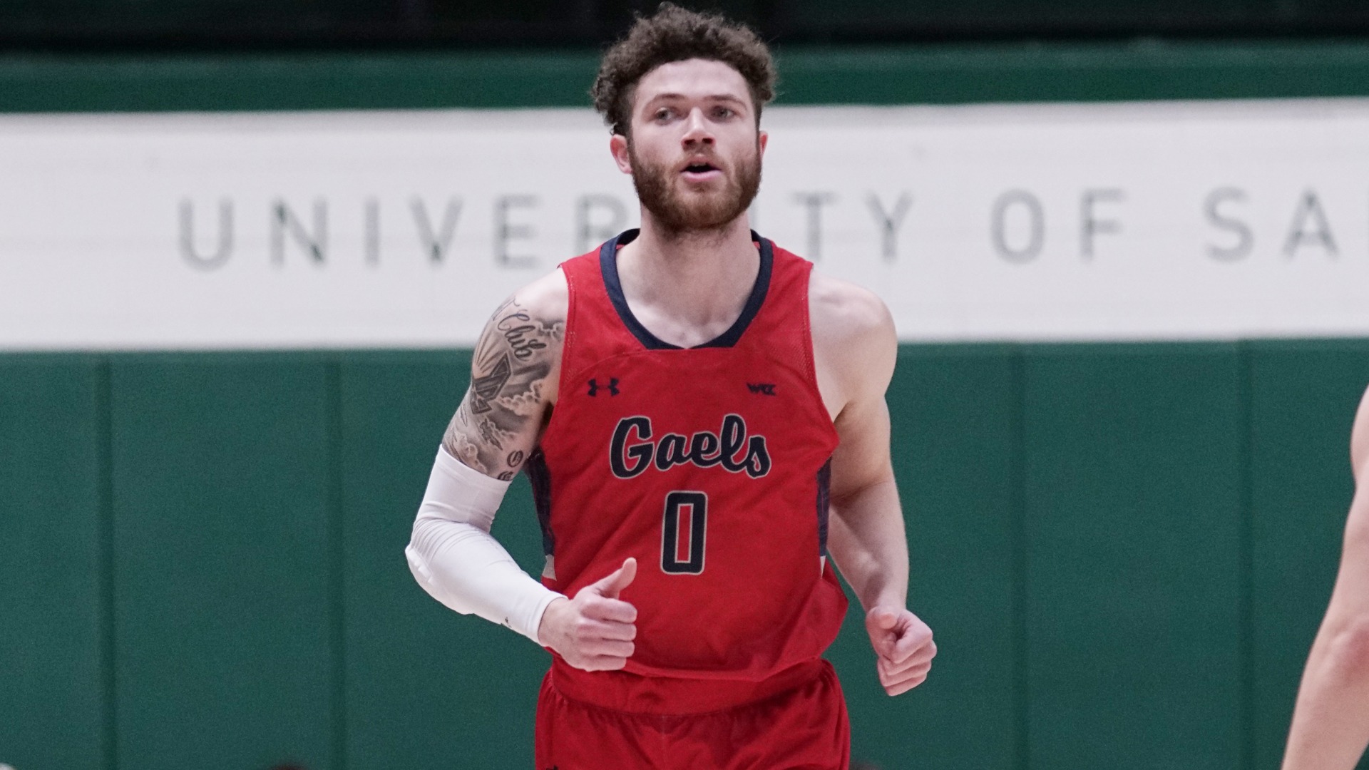 Logan Johnson - Men's Basketball - SMC California Athletics